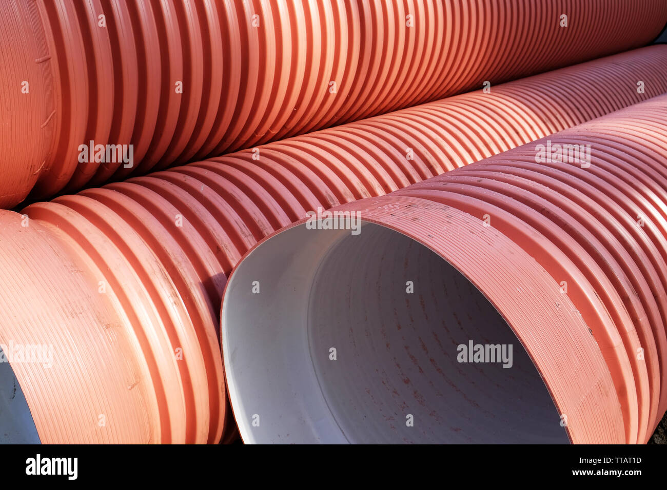 Heap of steel pipes close up Stock Photo - Alamy