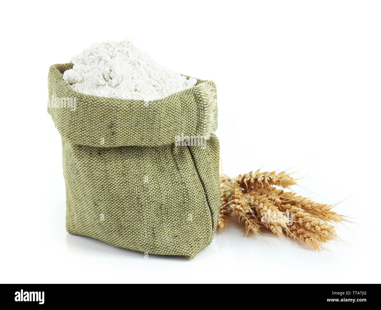 Wheat flour in burlap bag isolated on white Stock Photo - Alamy