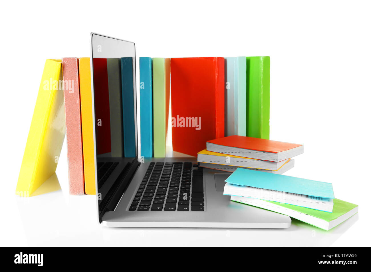 Stack of books with laptop isolated on white Stock Photo - Alamy