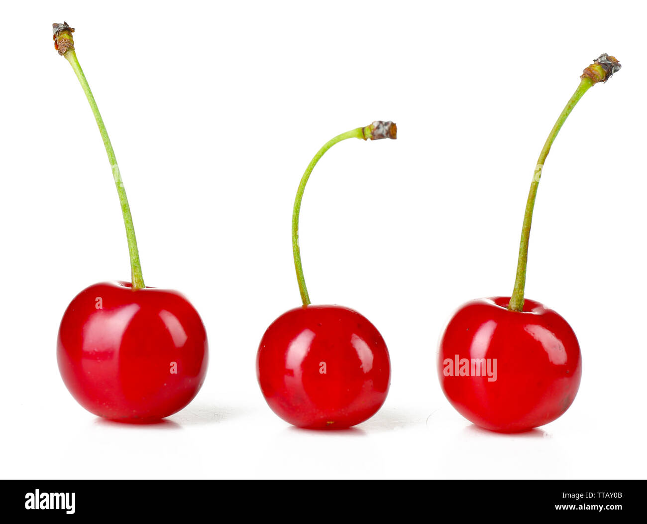 Fresh cherries isolated on white Stock Photo - Alamy