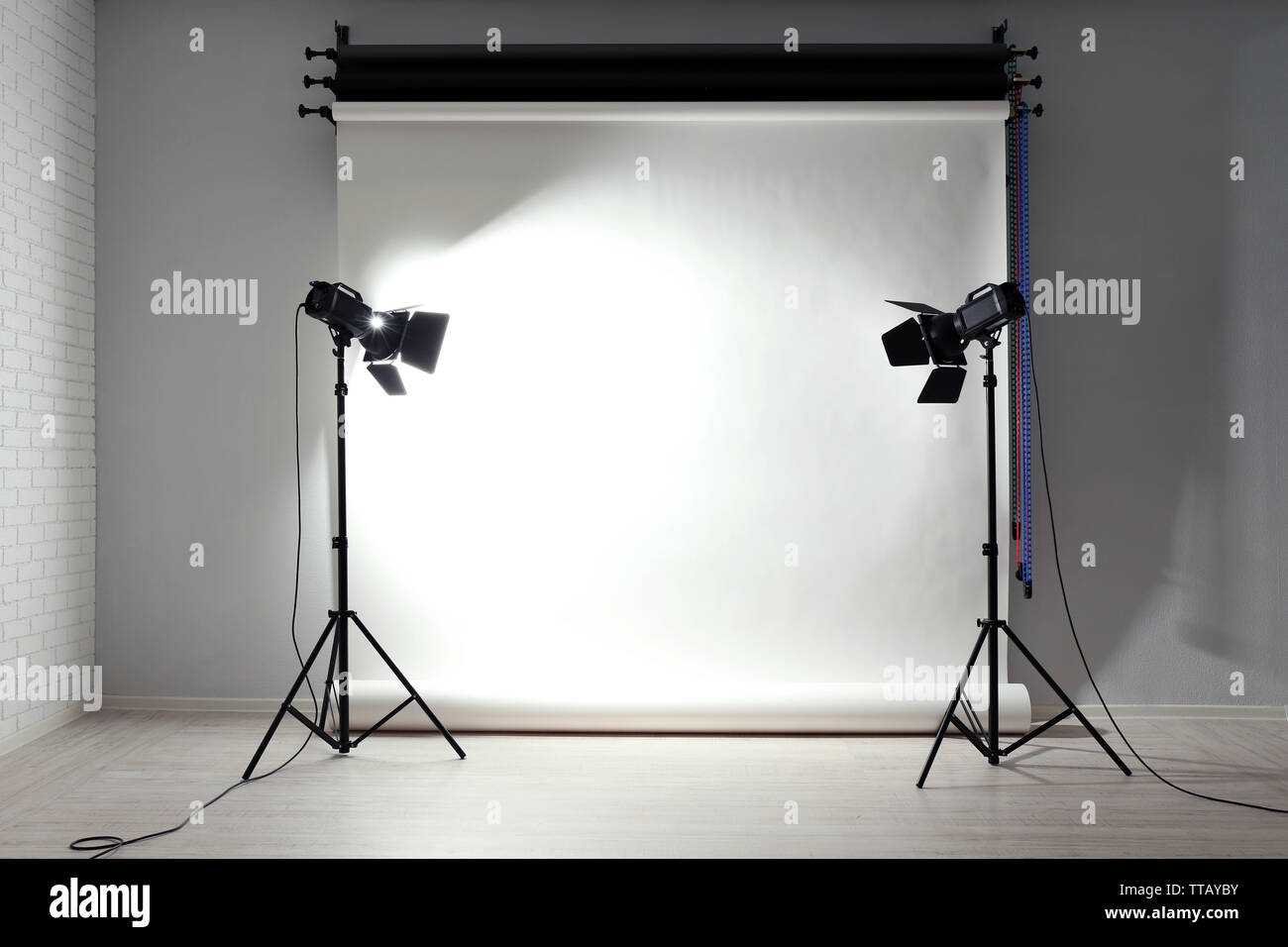 Empty photo studio with lighting equipment Stock Photo - Alamy