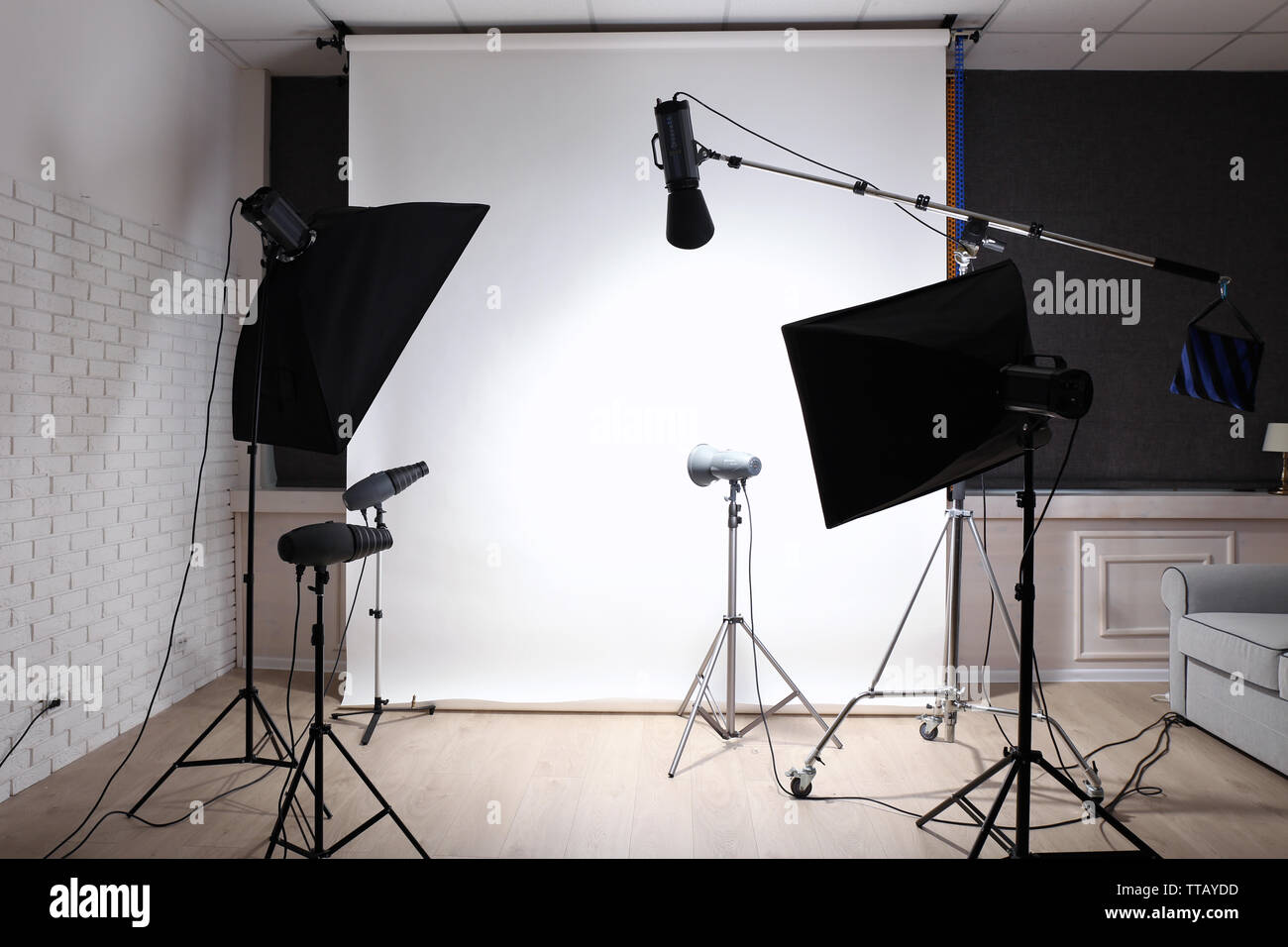 Empty photo studio with lighting equipment Stock Photo - Alamy
