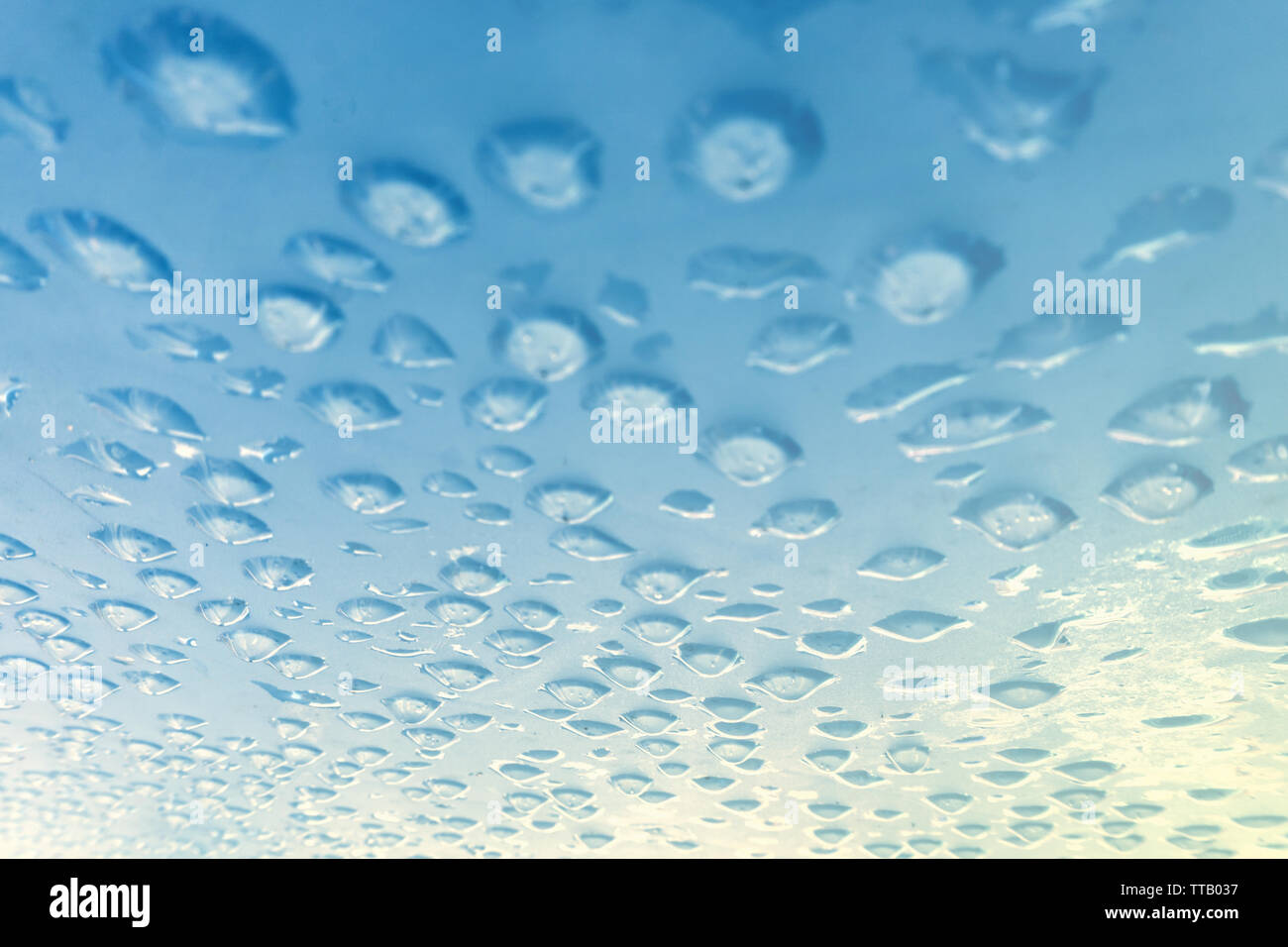 Blue wall after rain condensation walls. A drop of water on the wall ...
