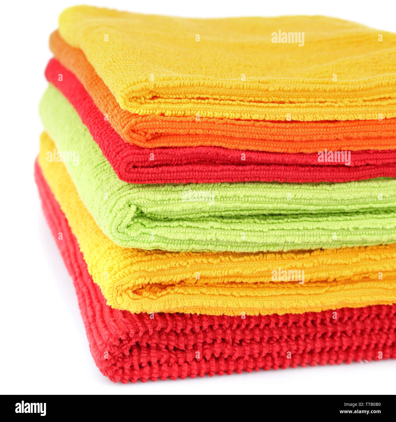 Colorful towels isolated on white Stock Photo - Alamy