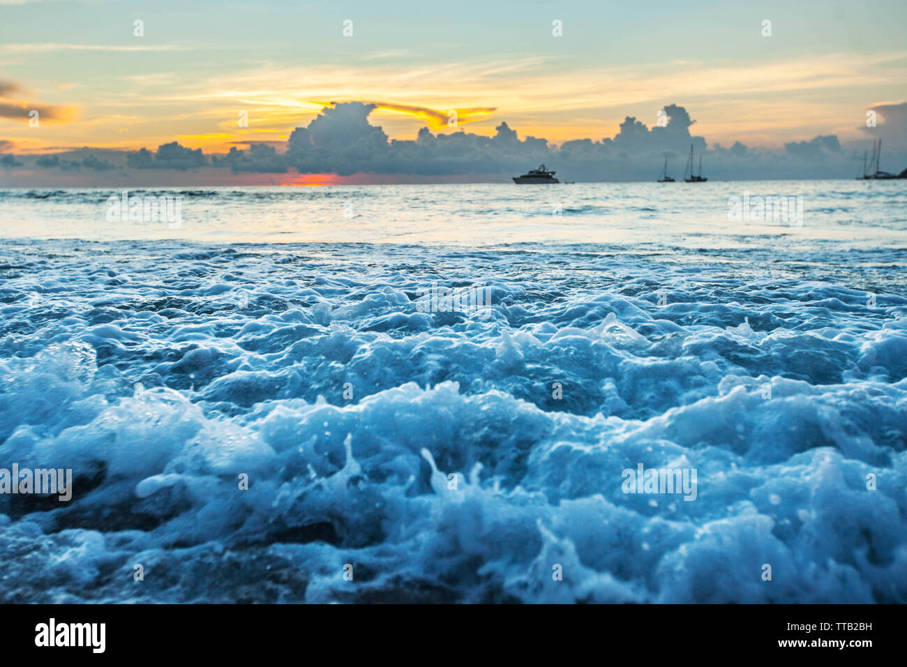 Radiant colorful sea beach sunset on Bali, Indonesia Stock Photo - Alamy