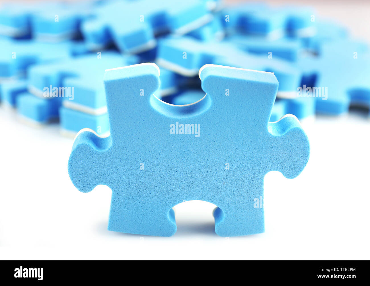 Pile of blue puzzle pieces, closeup Stock Photo - Alamy