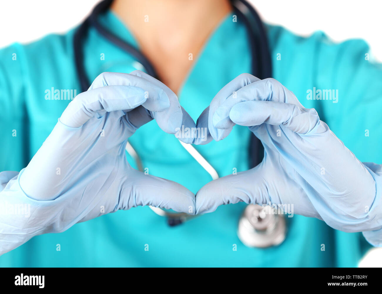 Doctor hands in gloves making shape of heart, closeup Stock Photo - Alamy