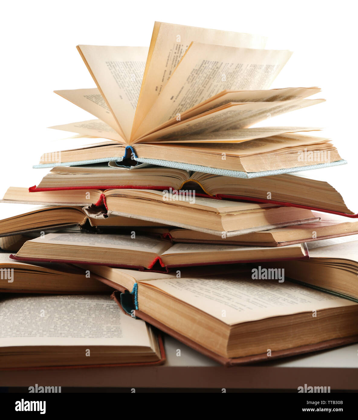 Many open books isolated on white Stock Photo - Alamy