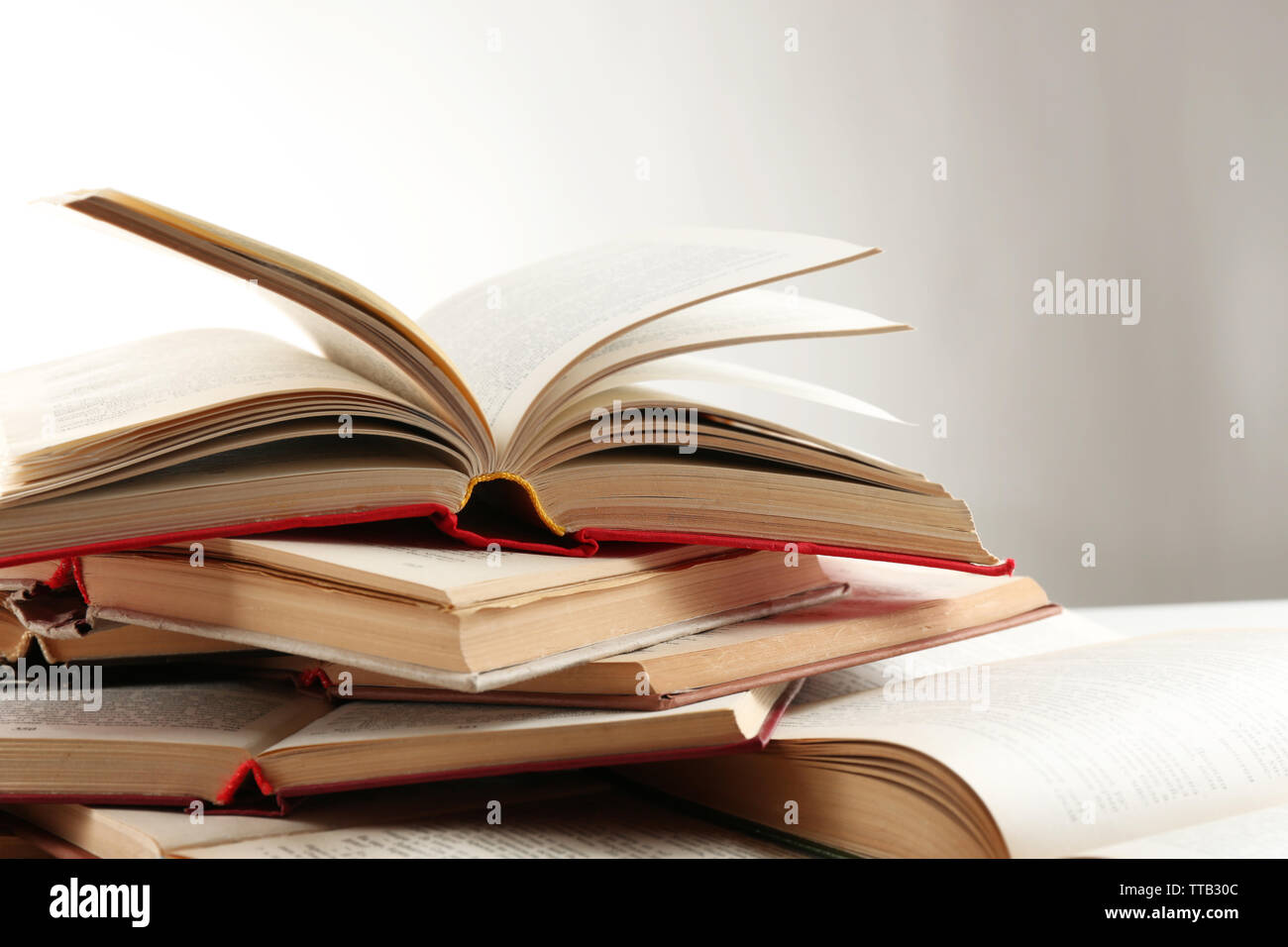 Pile of eight closed books hi-res stock photography and images - Alamy