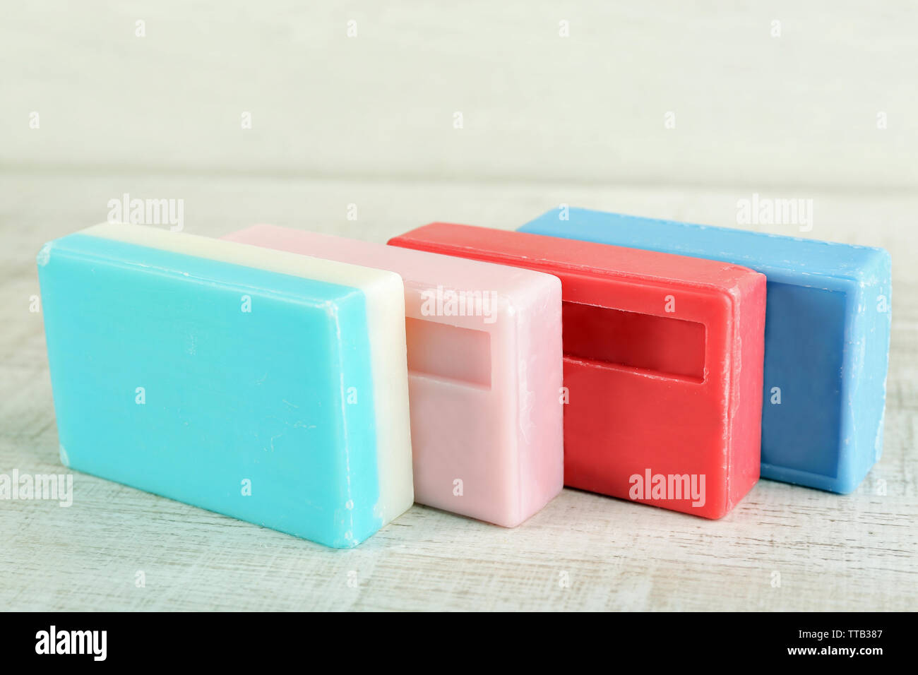 Bars of natural soap on light background Stock Photo - Alamy