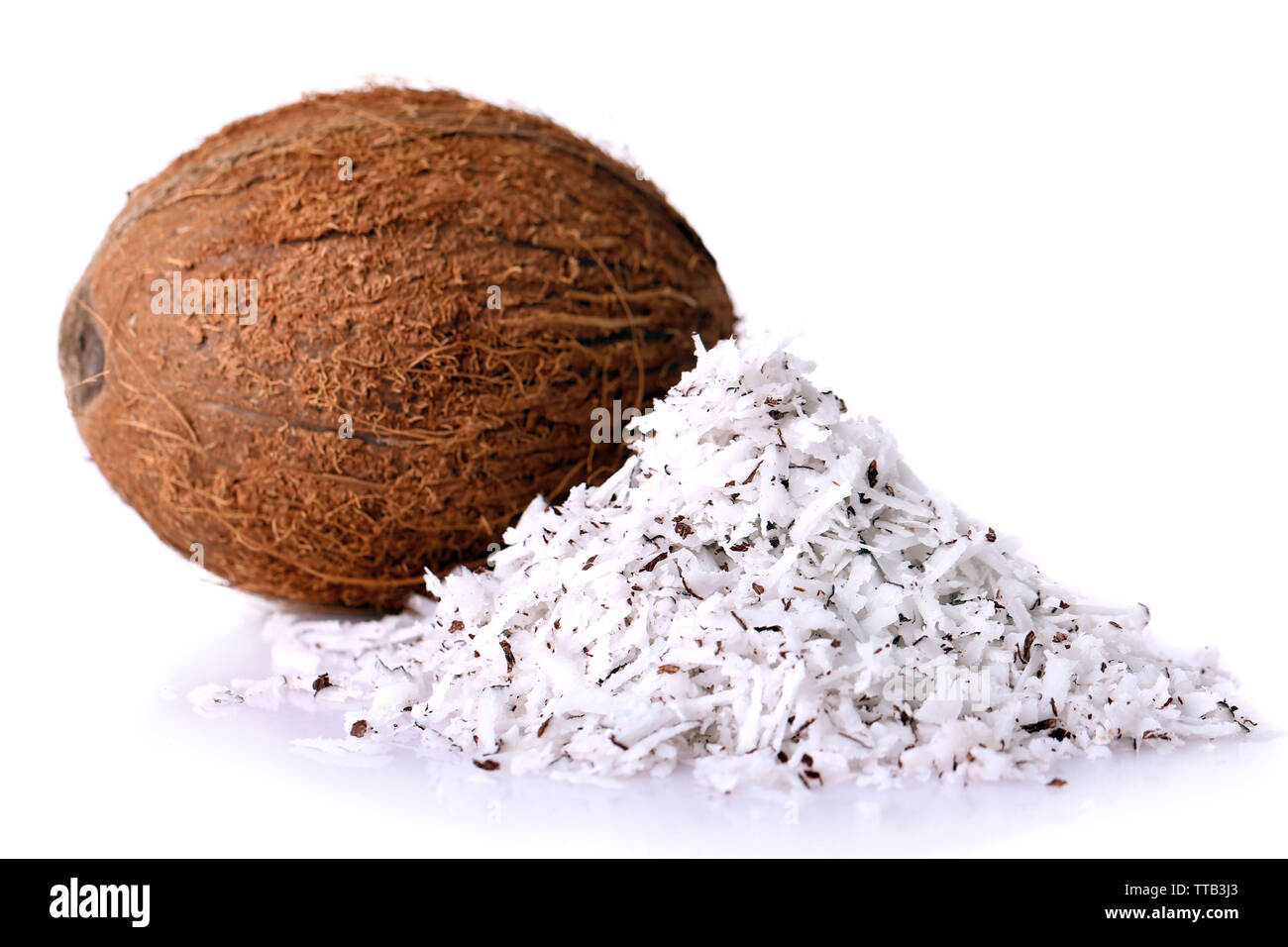 Coconut shavings with coconut isolated white background Stock Photo - Alamy