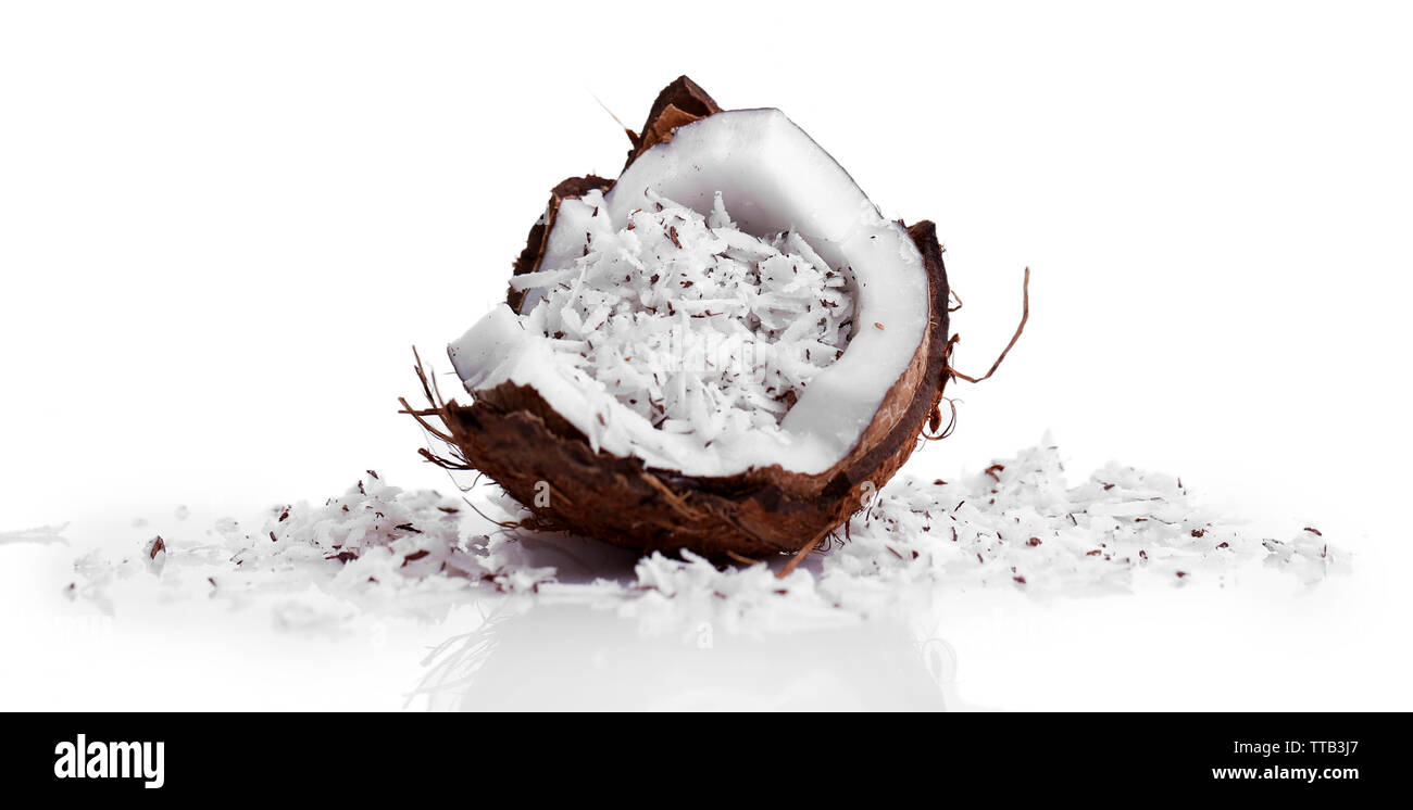 Coconut shavings in coconut isolated white Stock Photo - Alamy