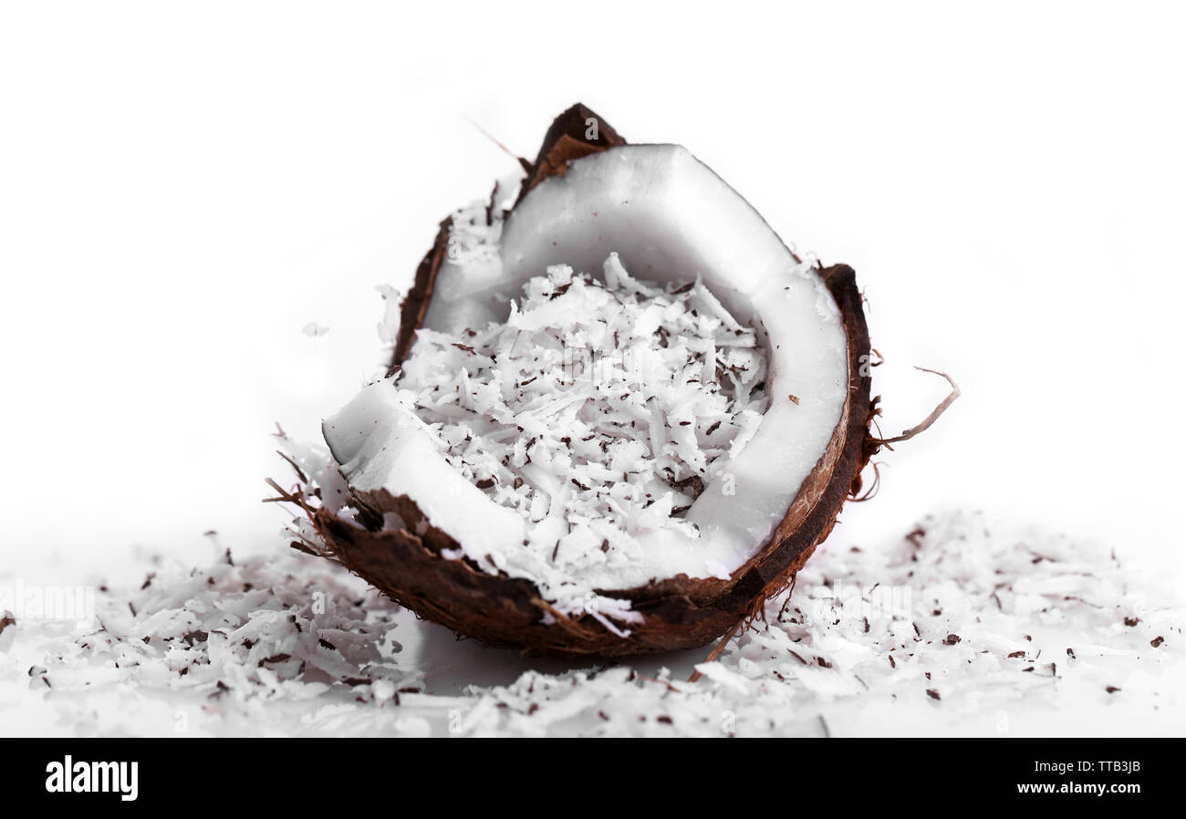 Coconut shavings in coconut isolated white Stock Photo - Alamy