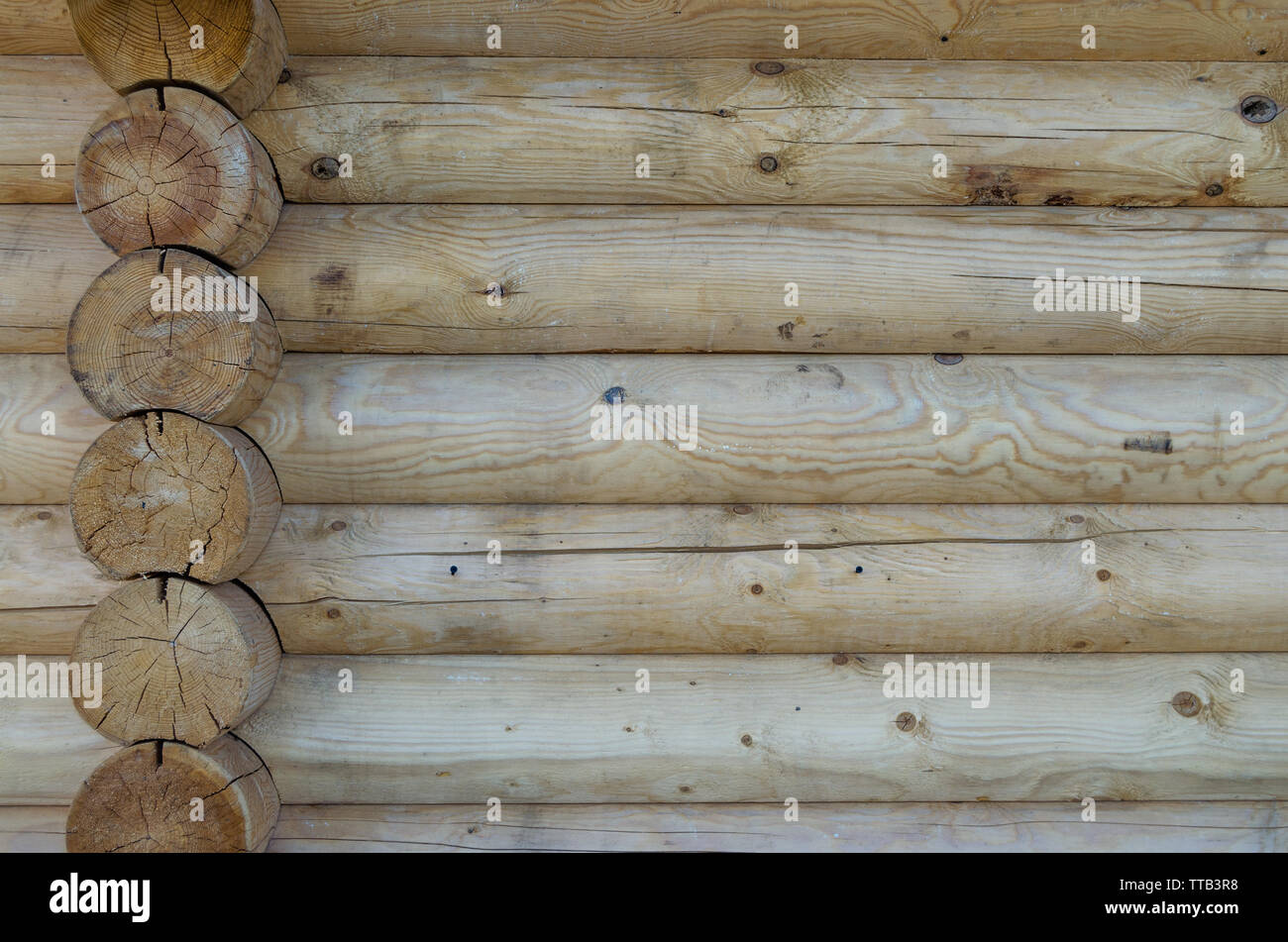 The wall of wooden house, log house from logs Stock Photo - Alamy