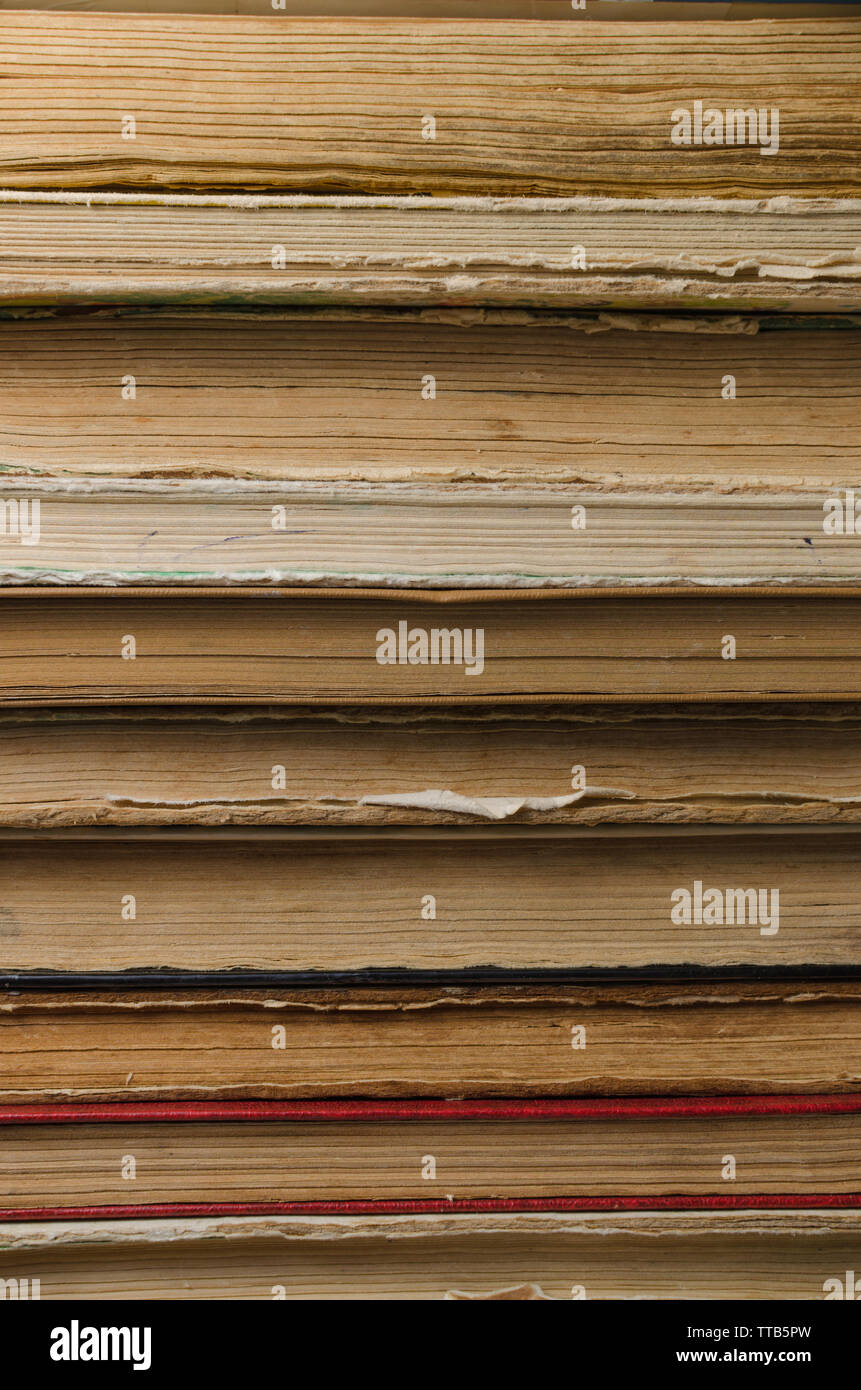 stack of old books closeup, shabby paper Stock Photo - Alamy