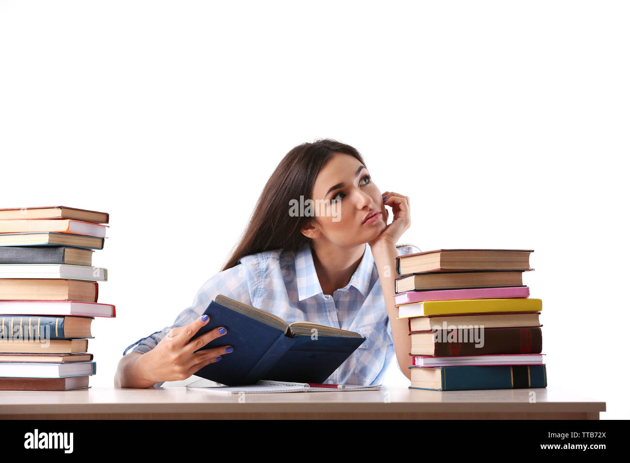 Young girl with books isolated on white Stock Photo - Alamy