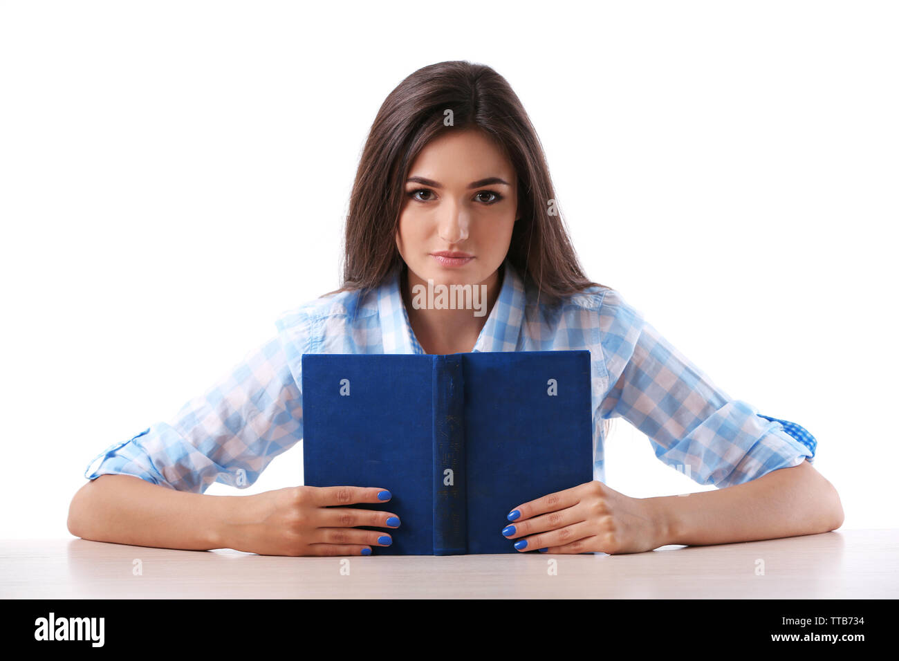 Young girl with book isolated on white Stock Photo - Alamy