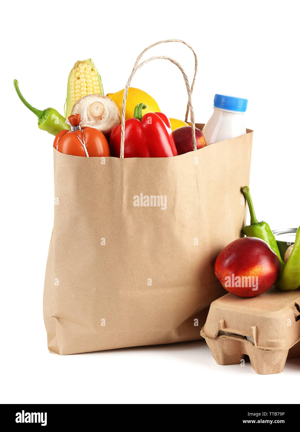 Paper bag with food isolated on white Stock Photo - Alamy