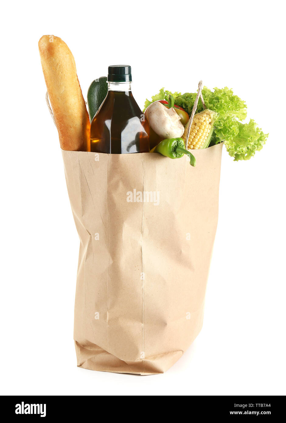 Paper bag with food isolated on white Stock Photo - Alamy