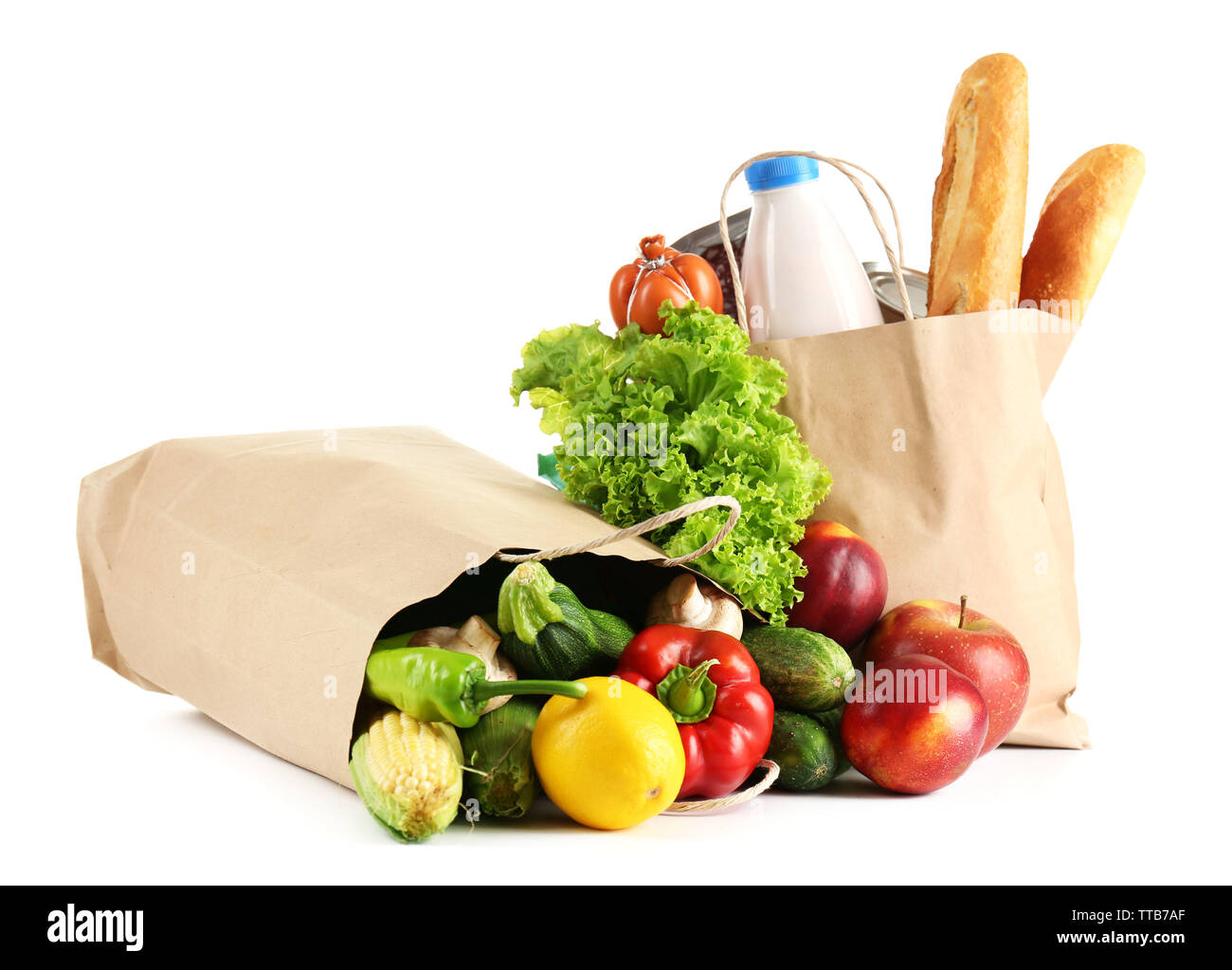 Paper bags with food isolated on white Stock Photo - Alamy