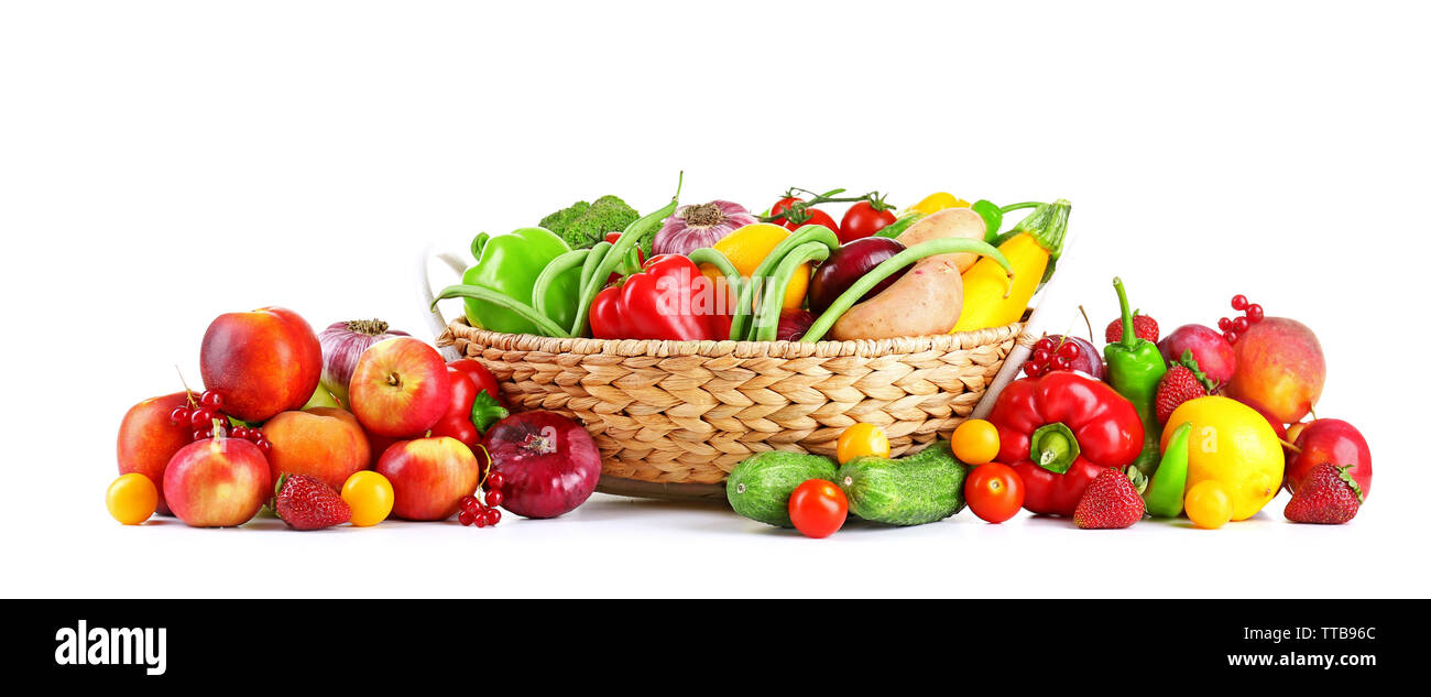 Heap of fresh fruits and vegetables in basket isolated on white Stock ...