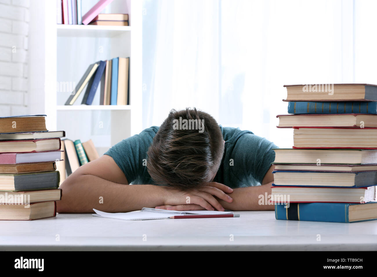 Man sleeping with book hi-res stock photography and images - Alamy