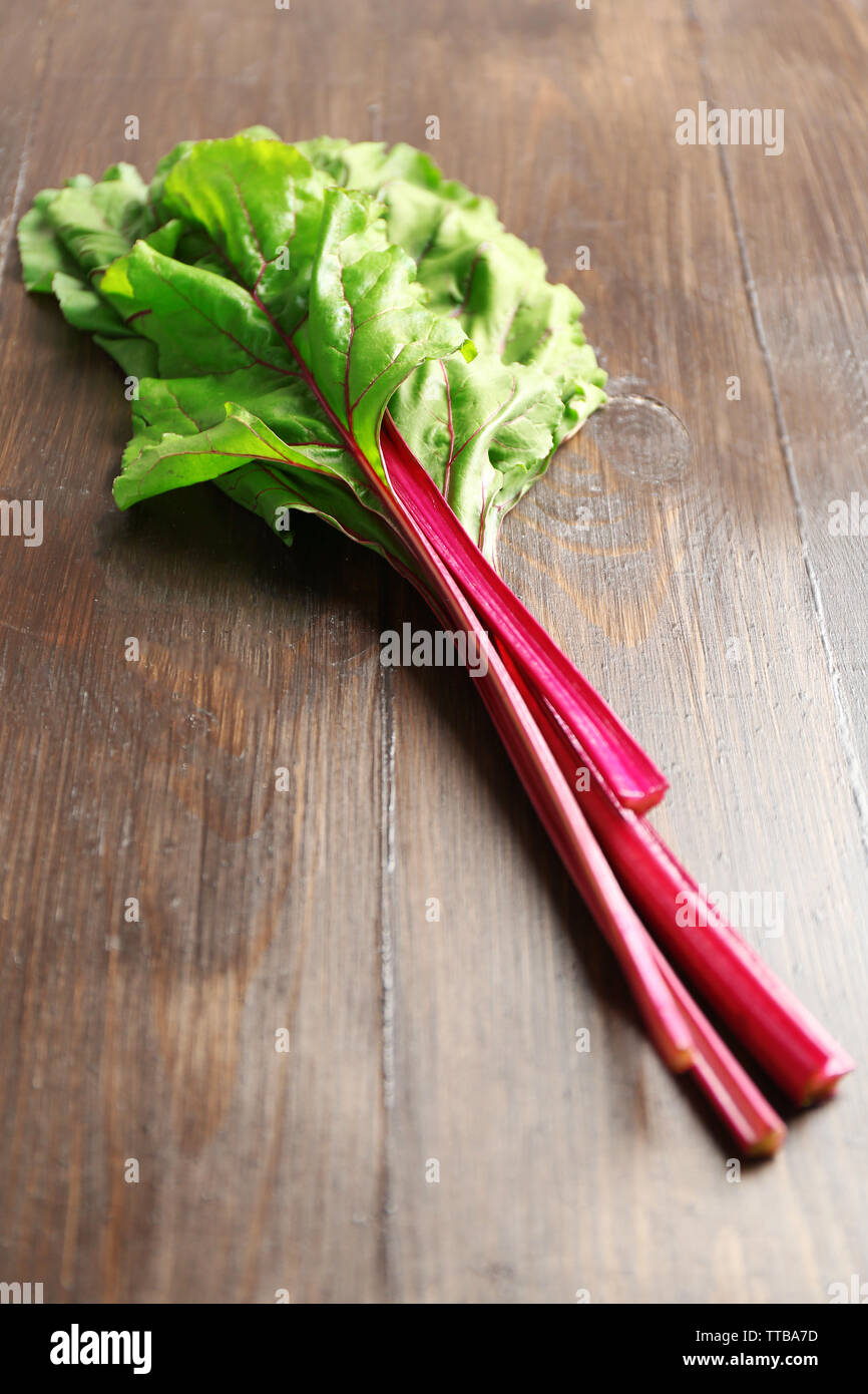 Fresh swiss chard on wooden table, close up Stock Photo - Alamy