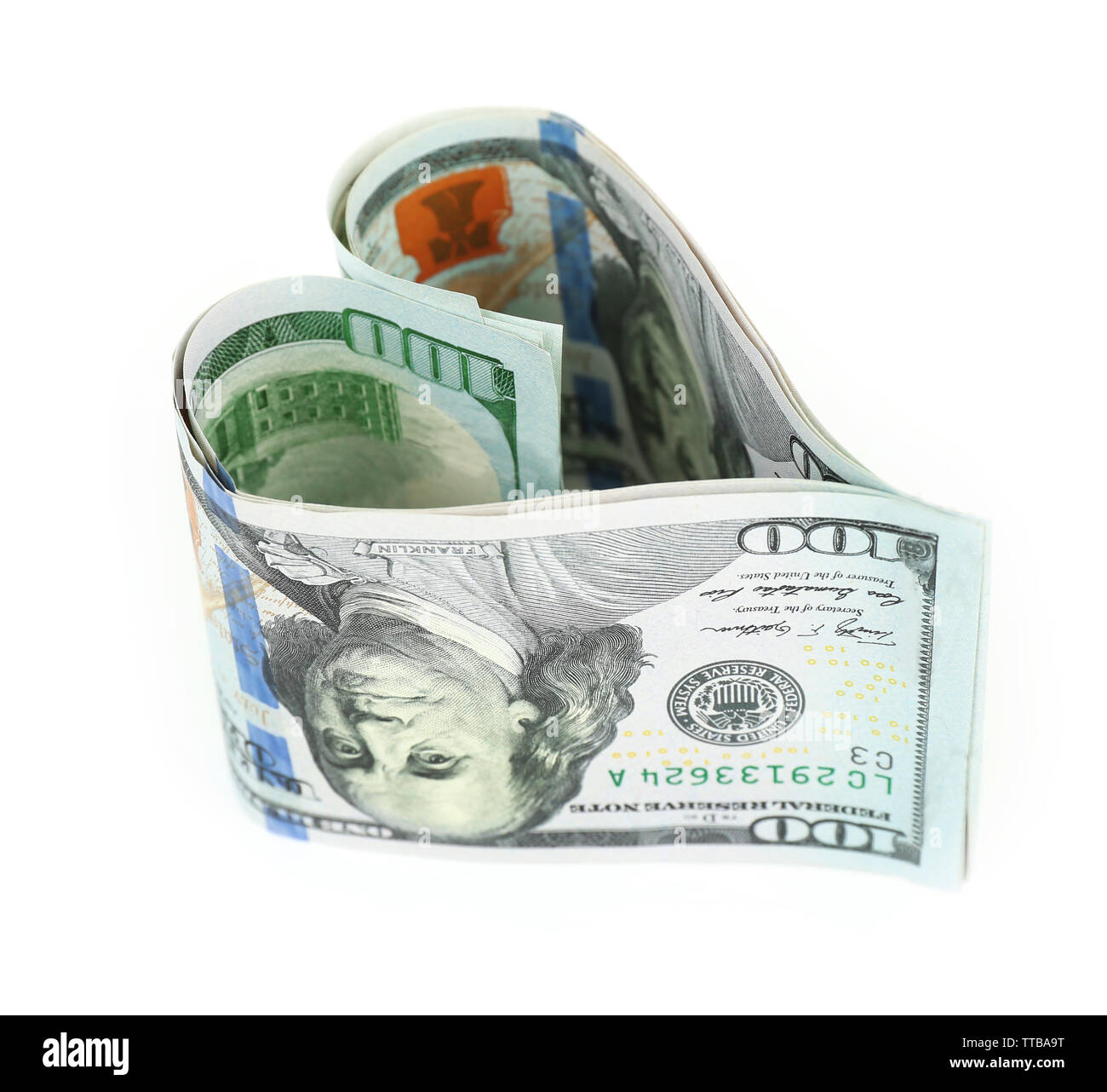 Money in form heart hi-res stock photography and images - Alamy