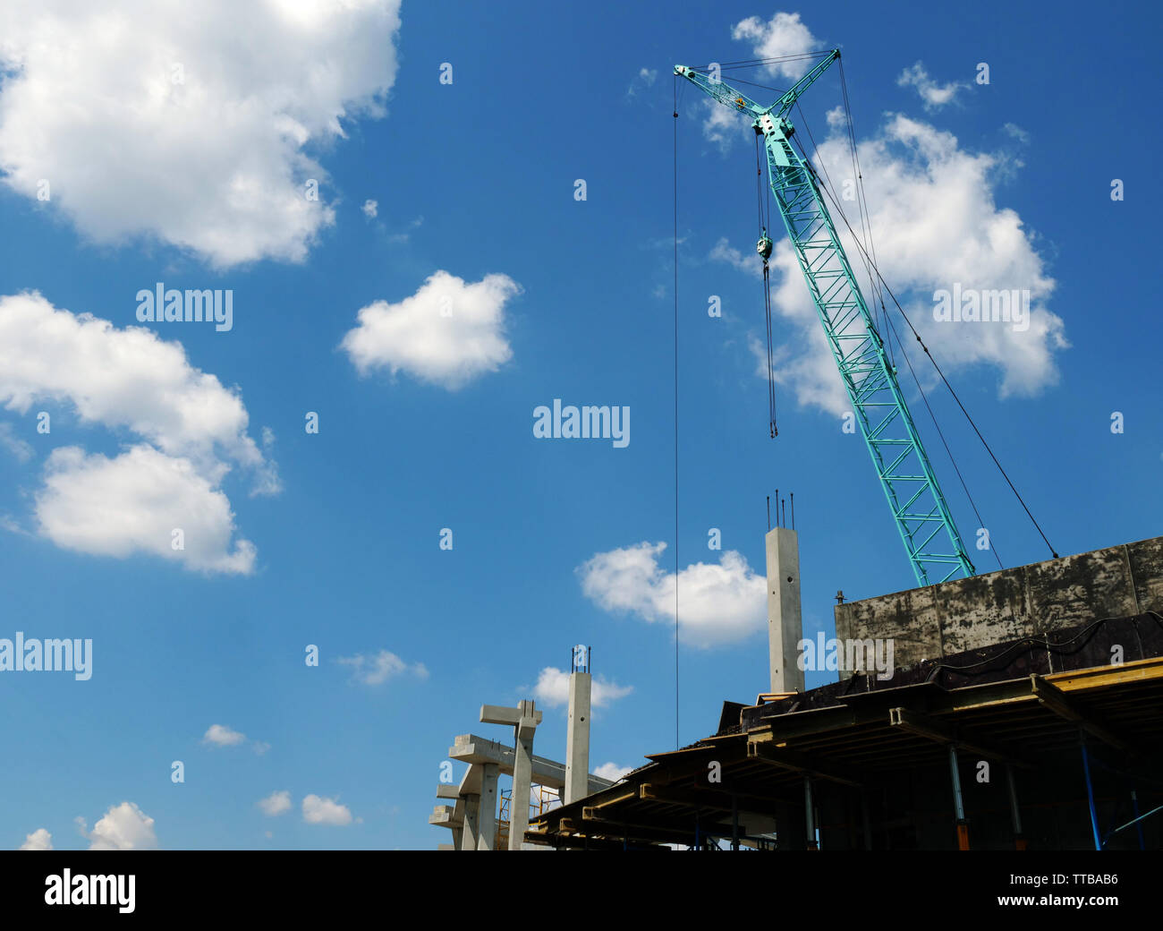 Industrial construction and crane. Building concrete frame Stock Photo ...
