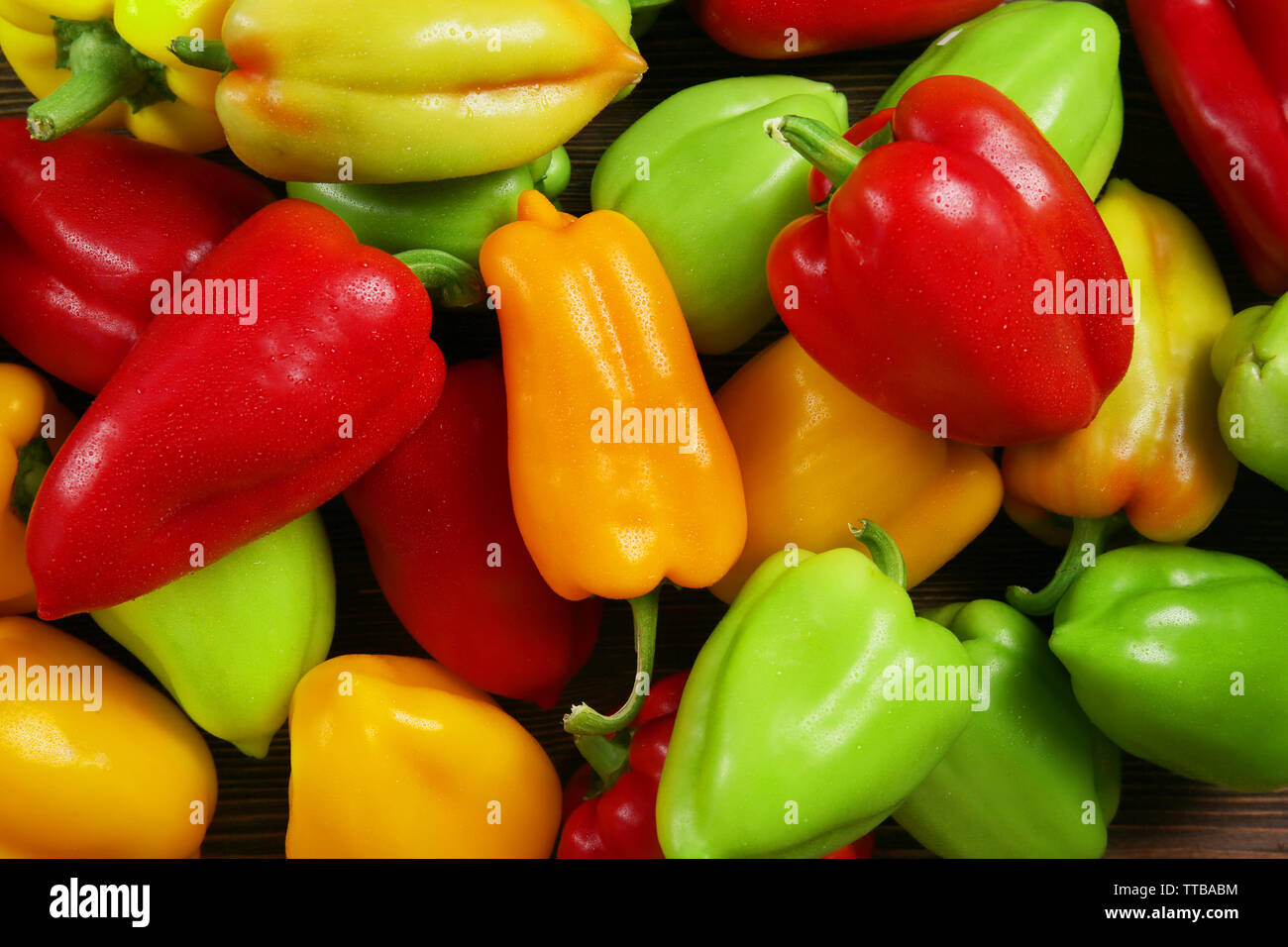 Colorful peppers background Stock Photo - Alamy