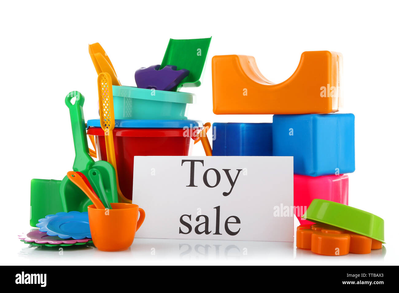 Toys for sale, isolated on white Stock Photo - Alamy