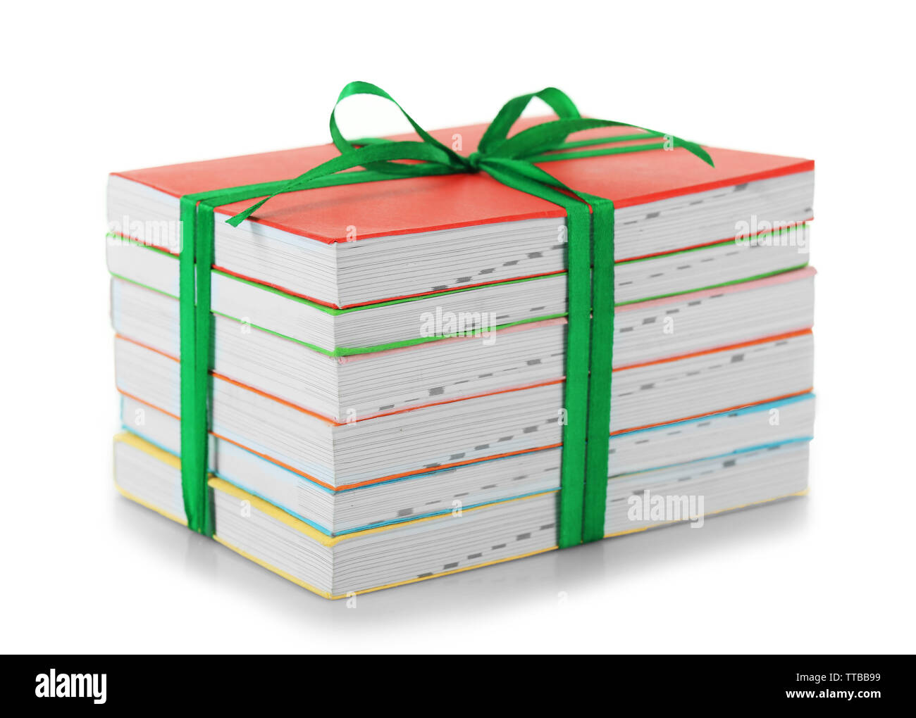 Stack of books with ribbon isolated on white Stock Photo - Alamy