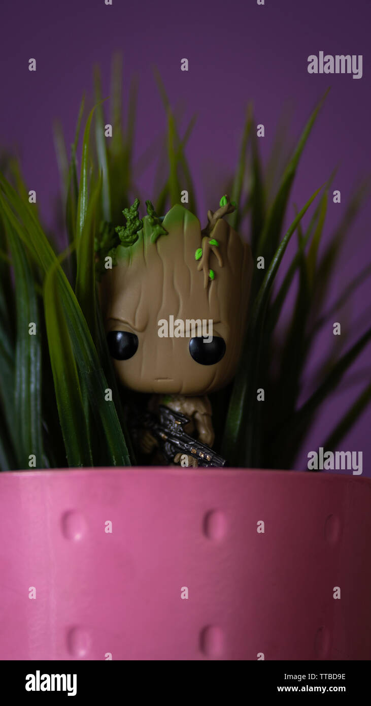 marvel groot character tucked into a plant Stock Photo - Alamy