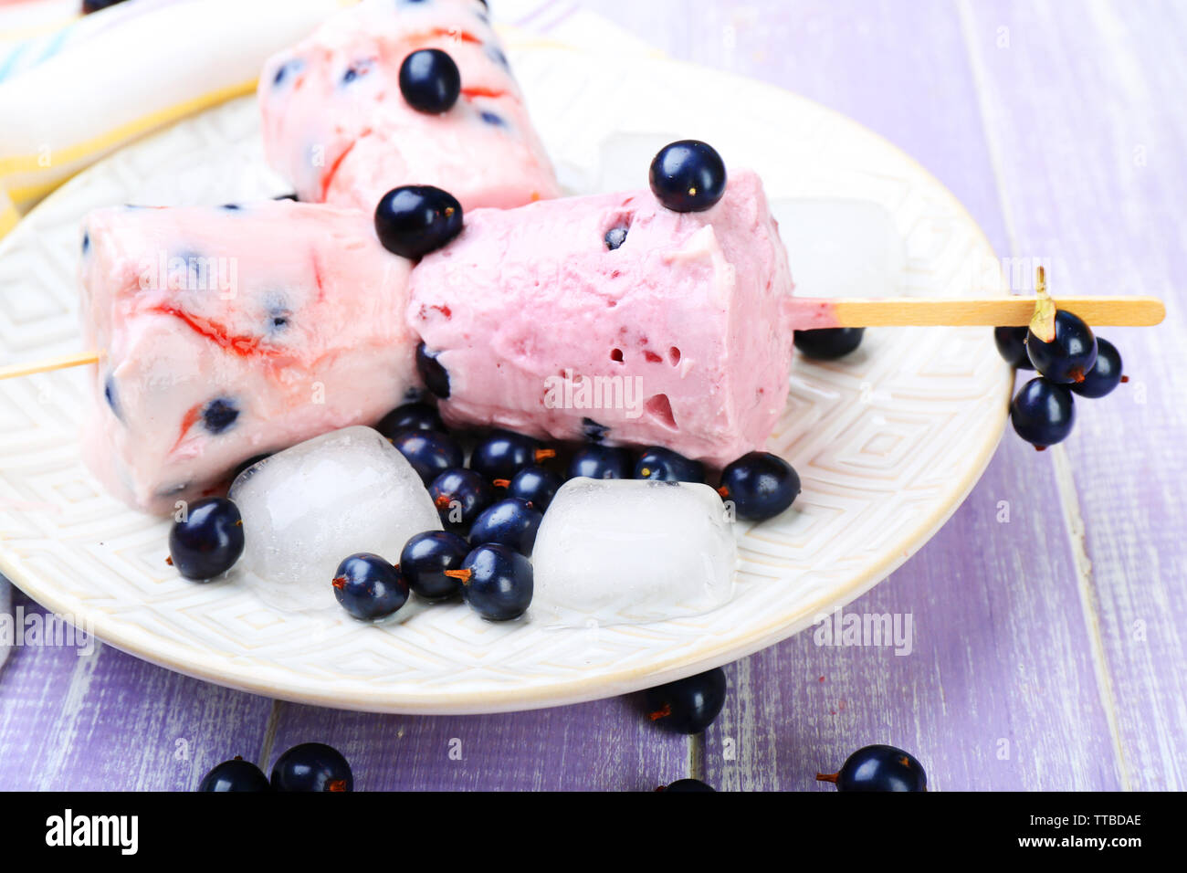 Sweet ice cream with black currants in white plate, closeup Stock Photo ...