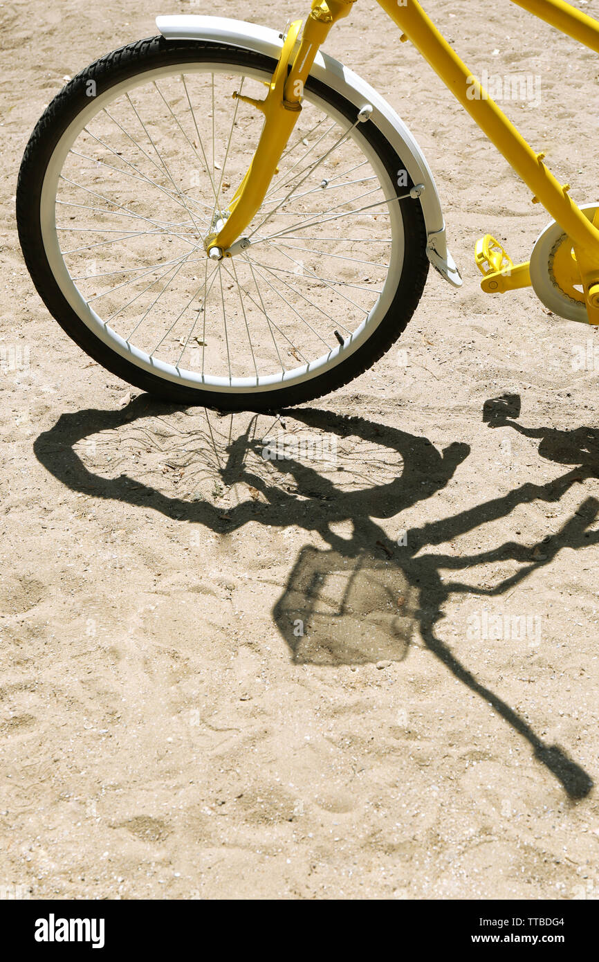 Bicycle over sand background Stock Photo - Alamy