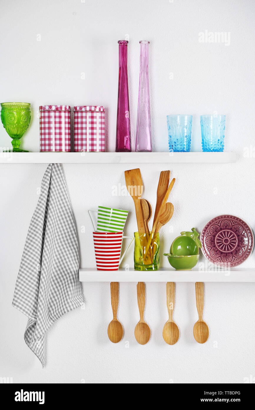 Kitchen utensils on wooden shelves, close up Stock Photo - Alamy