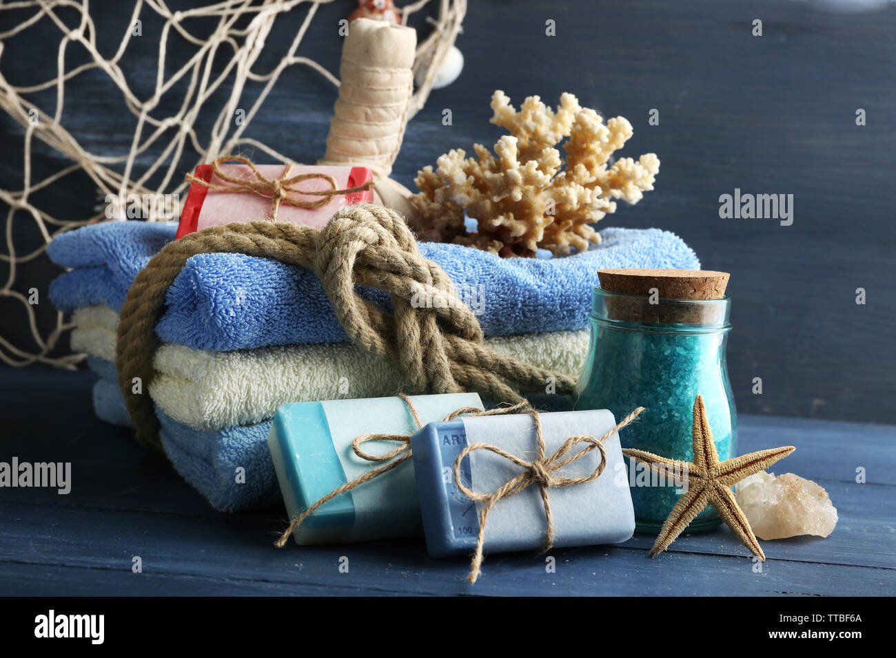 Spa treatments on blue background. Sea spa concept Stock Photo - Alamy