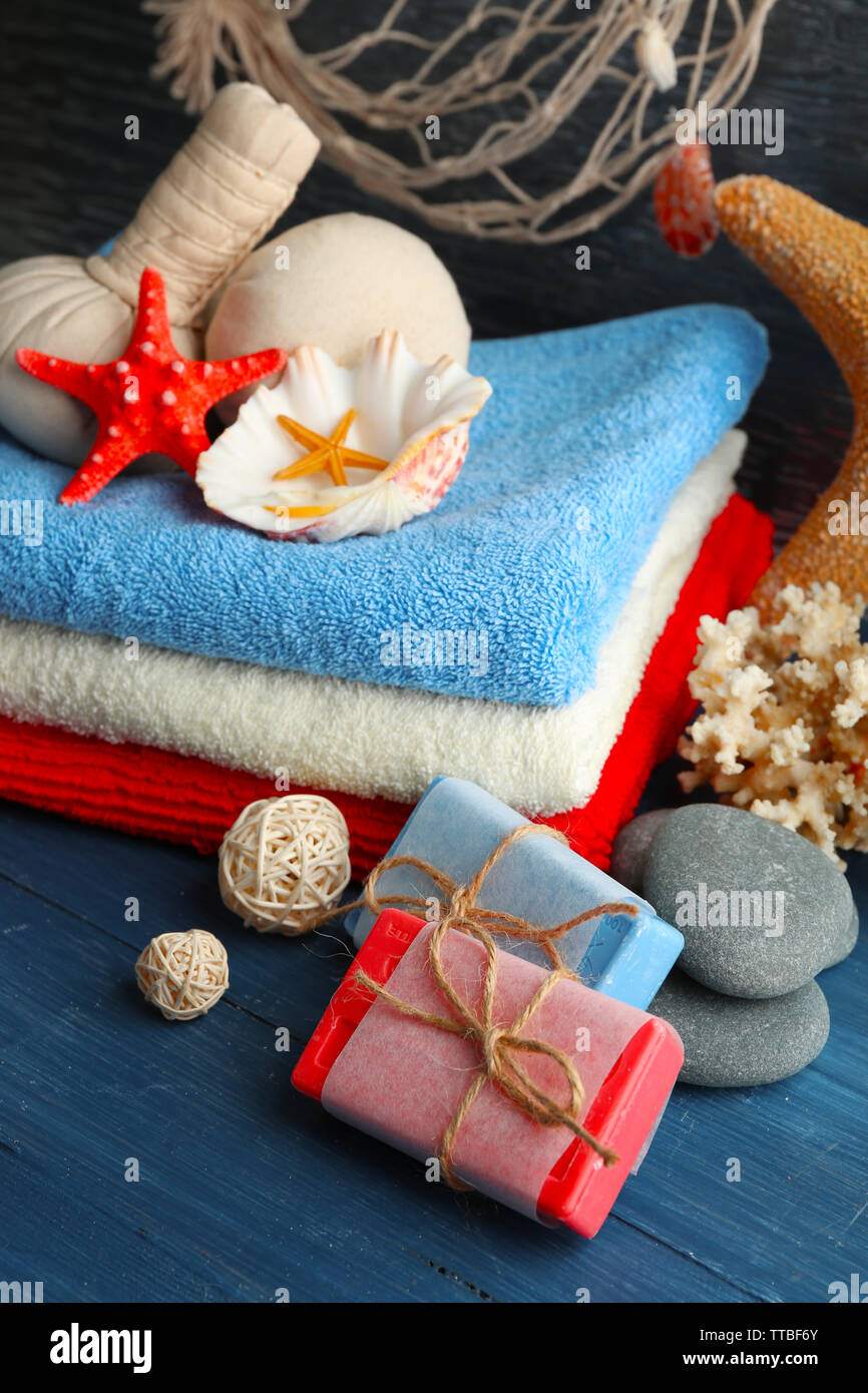 Spa treatments on blue background. Sea spa concept Stock Photo - Alamy