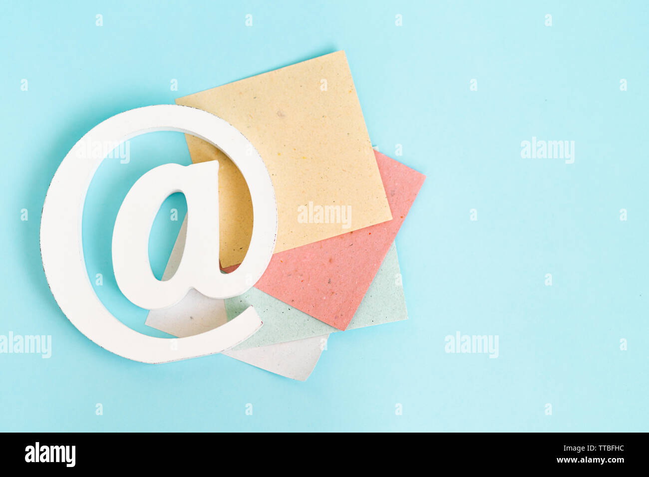 email sign on a stack of stickers on blue background Concept for email ...