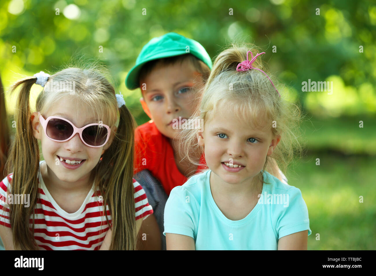 Happy active children outdoors Stock Photo - Alamy