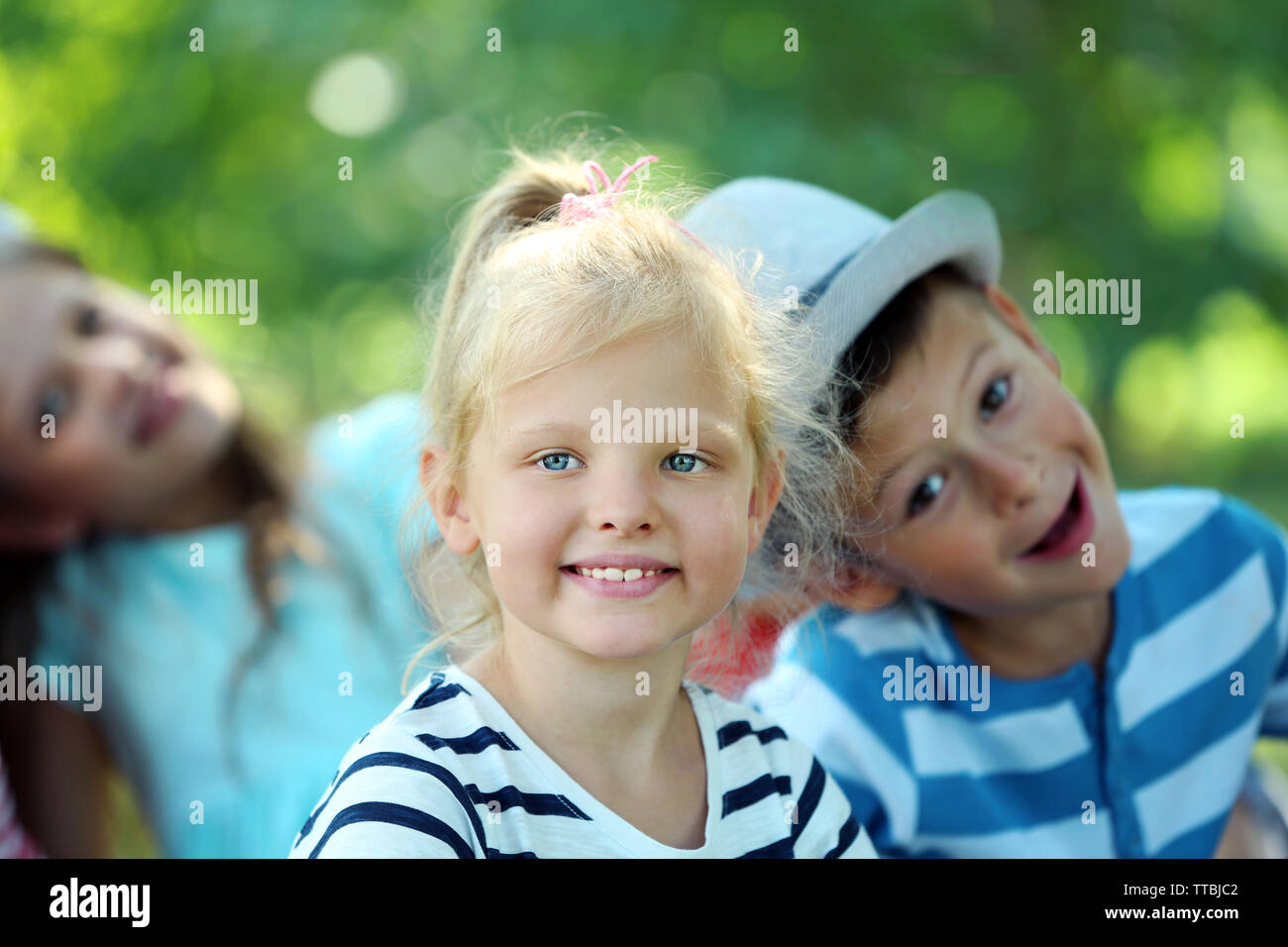 Happy active children outdoors Stock Photo - Alamy