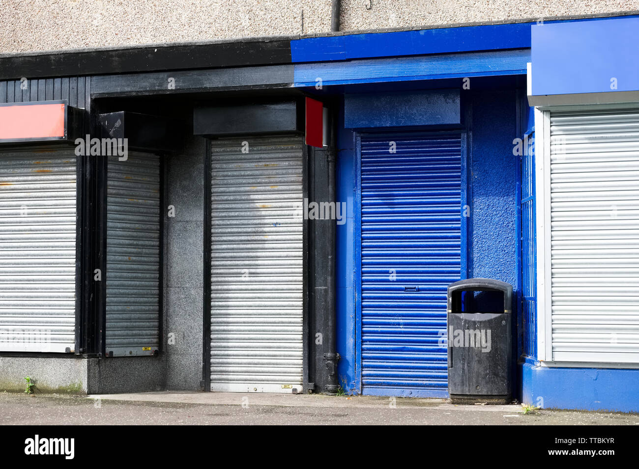 Blue and black shop business closed metal roller shutters Stock Photo ...