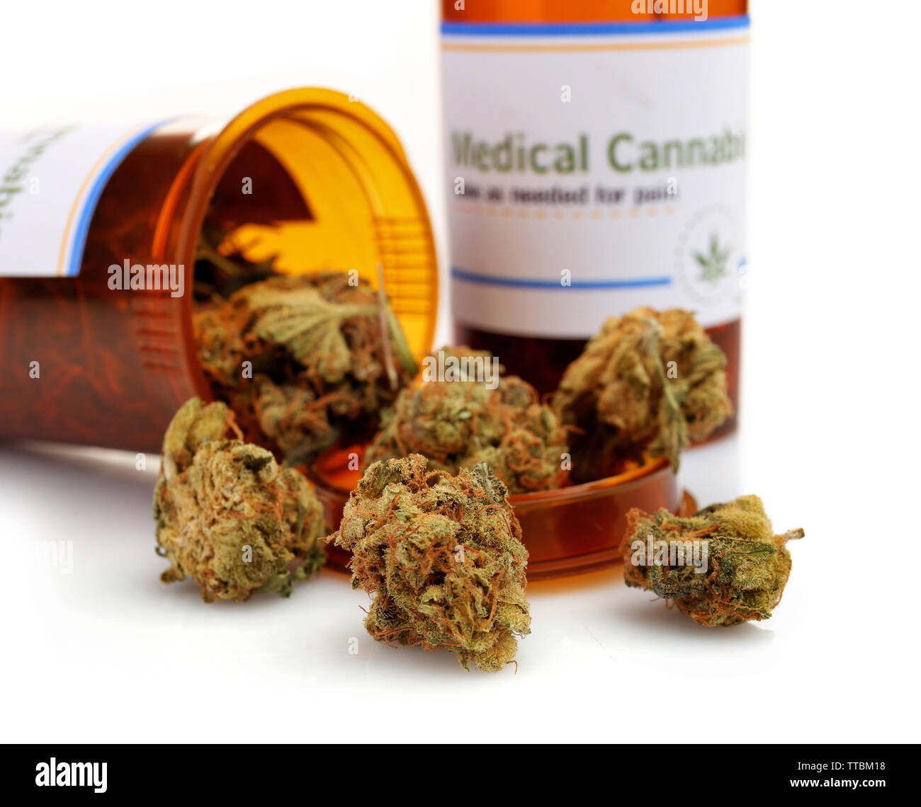 Bottles of dry medical cannabis isolated on white Stock Photo - Alamy