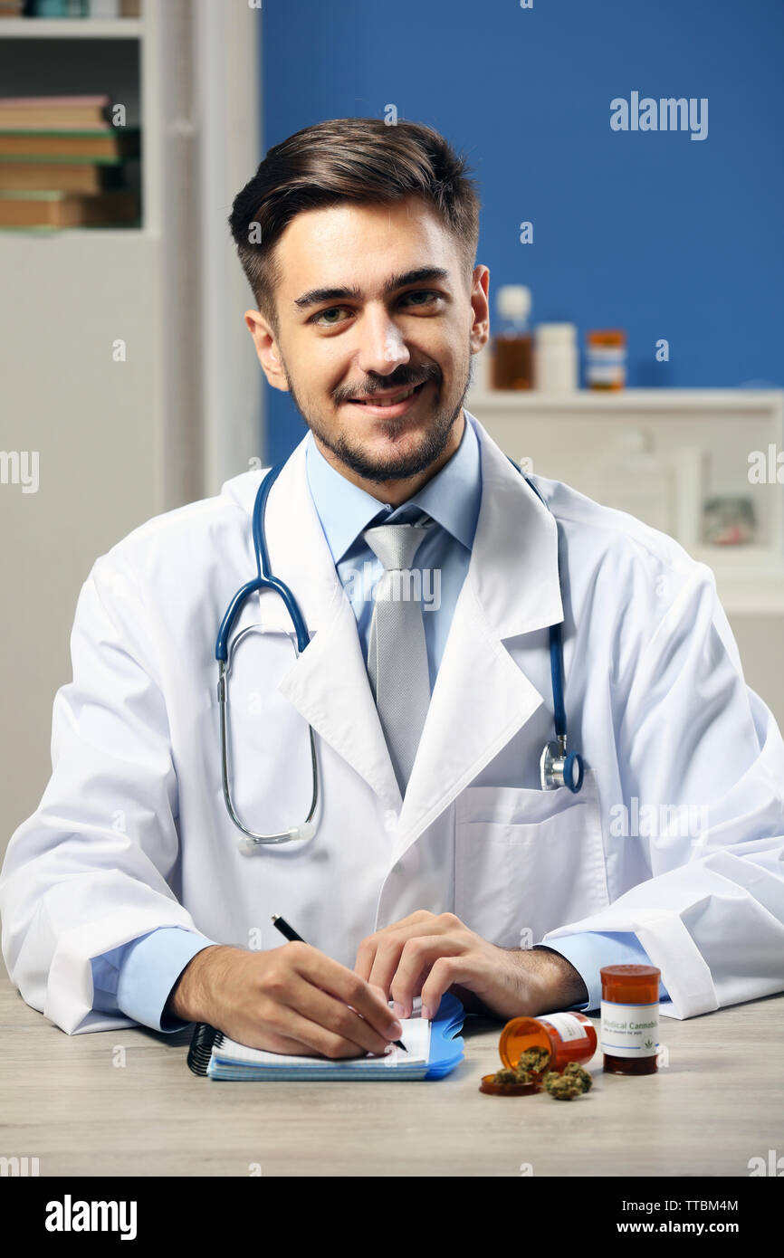 Doctor working in office Stock Photo - Alamy