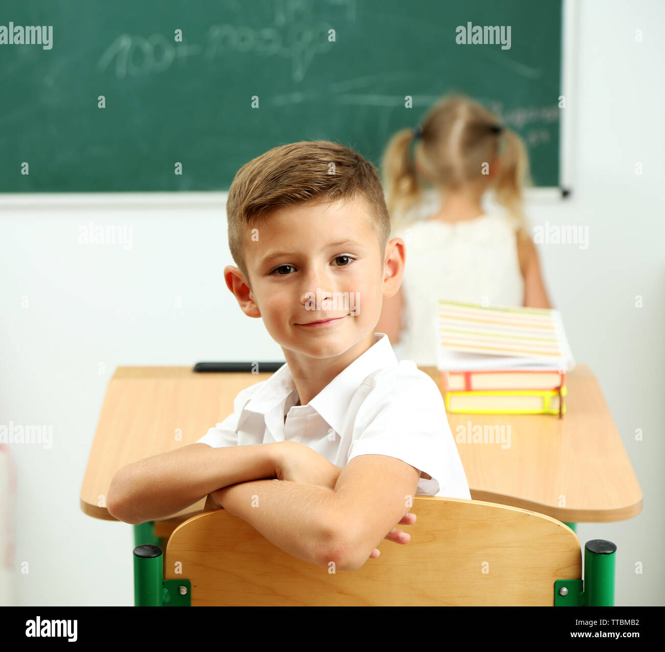Portrait of happy pupil at lesson Stock Photo - Alamy