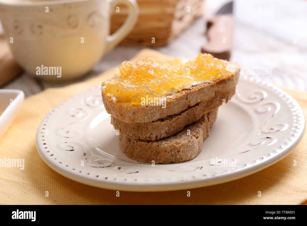 Fresh toast with butter and jam on table close up Stock Photo - Alamy
