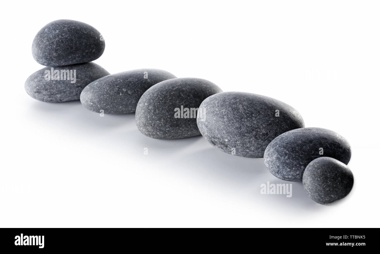 Spa stones isolated on white Stock Photo - Alamy