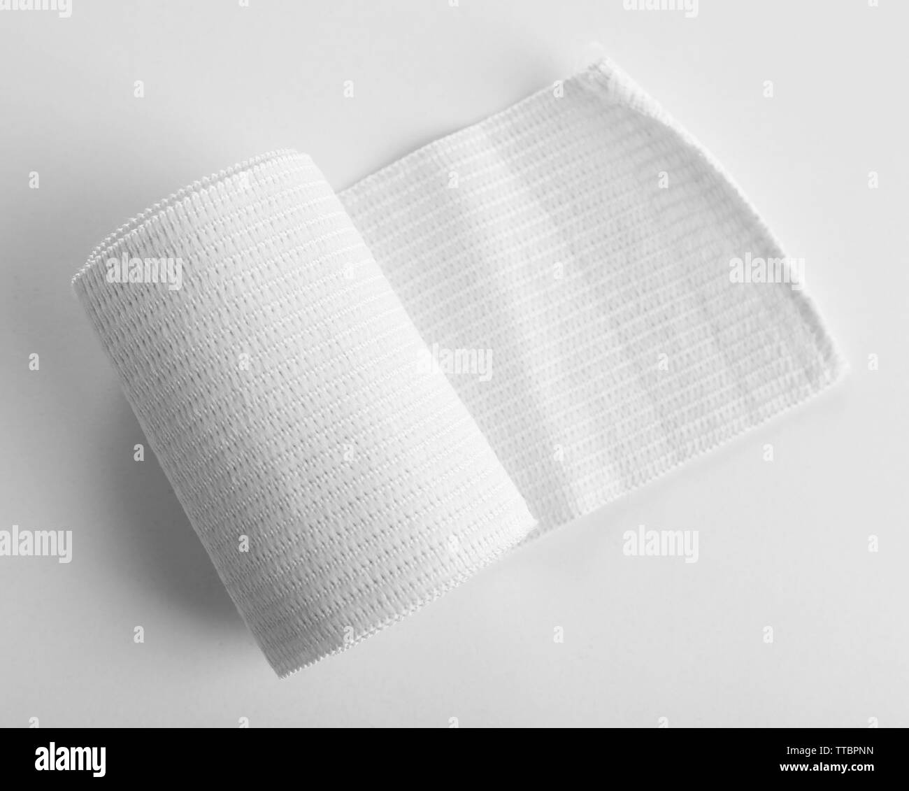 Medical bandage roll isolated Stock Photo - Alamy