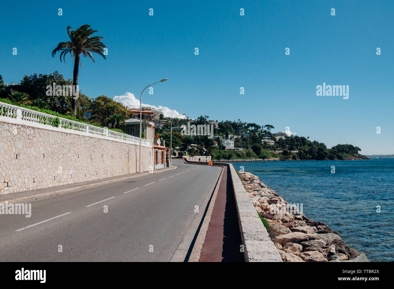 Road along the shore in Cannes, France Stock Photo - Alamy