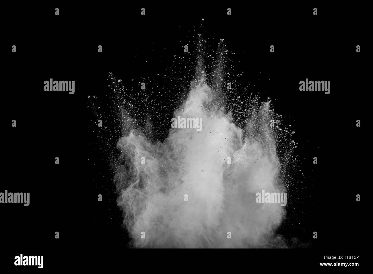 White talcum powder explosion on Black and White Stock Photos & Images ...